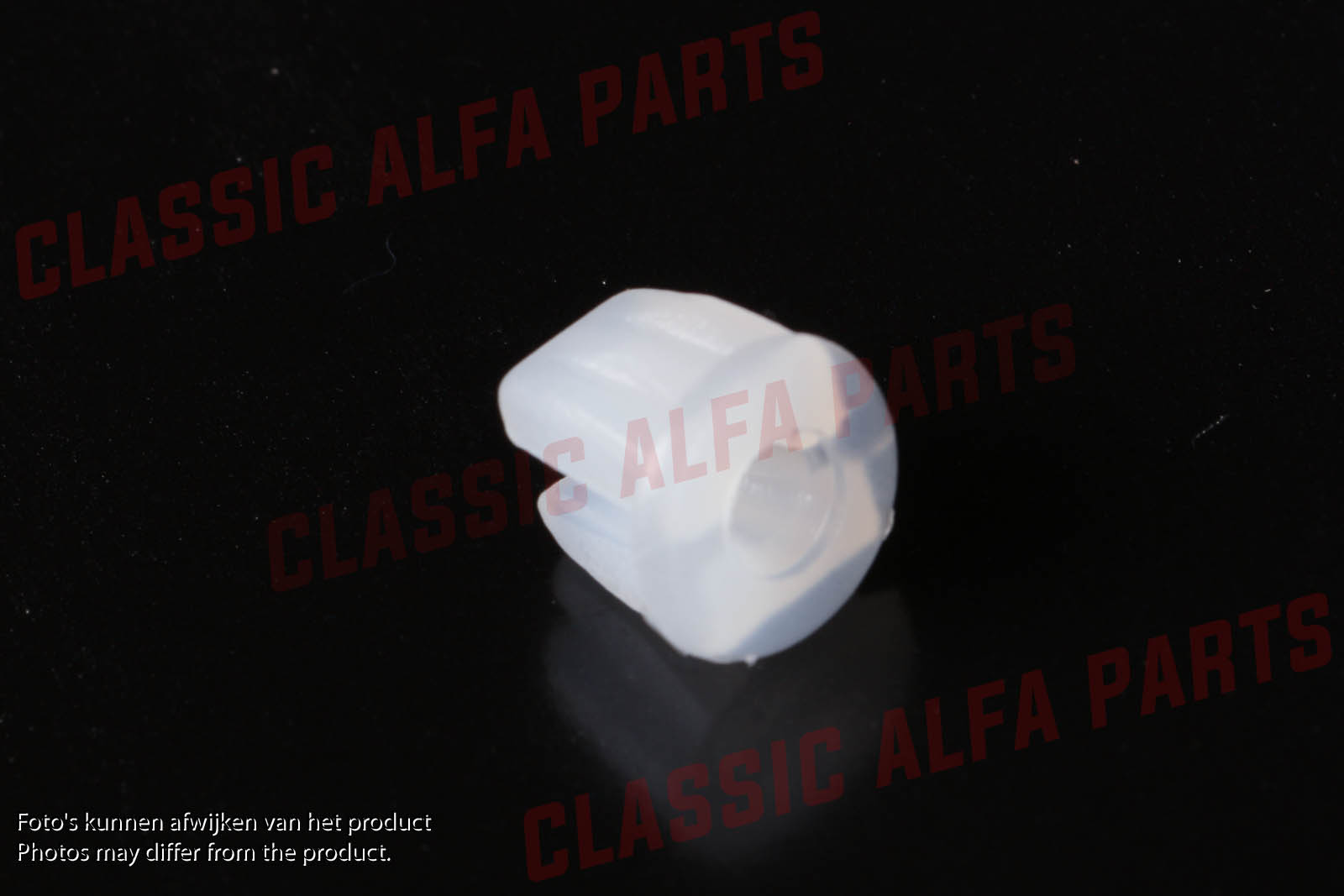 Dopje bevestiging koplamphuis